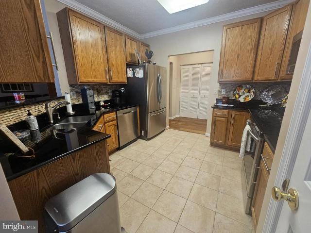 9501 Kingscroft Terrace # H