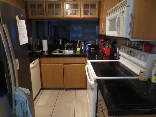 9553 W McNab Rd, Unit 104, Tamarac, FL 33321 | MLS #F10540 | Compass