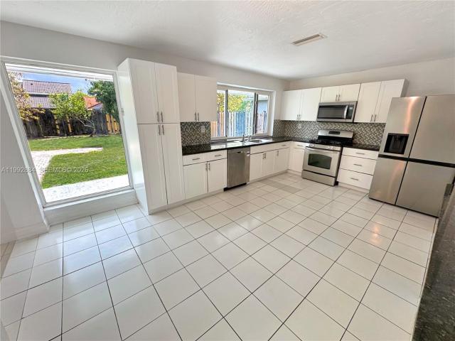 9574 NW 19th Pl, Sunrise, FL 33322 | MLS #A11992 | Compass