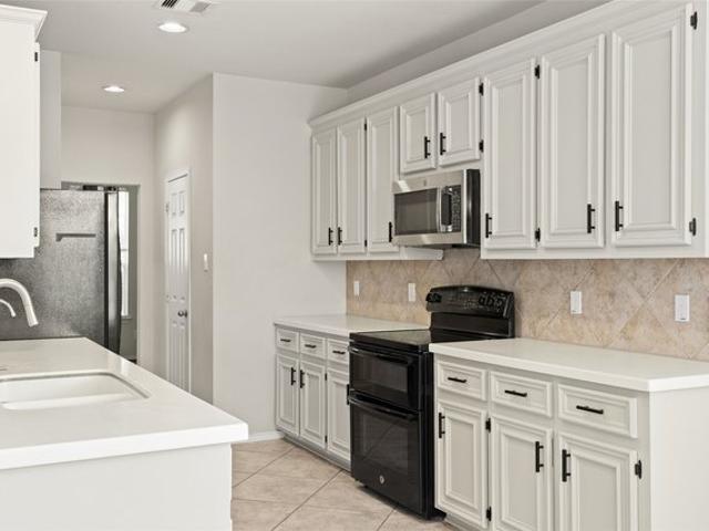 9611 Oxford Grove Dr, Houston, TX 77095