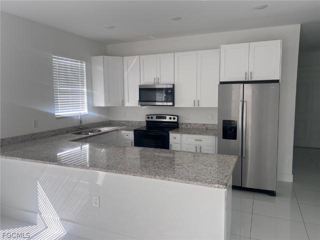 970 Lakeside Dr, Lehigh Acres, FL 33974 | MLS #2026010 | Compass