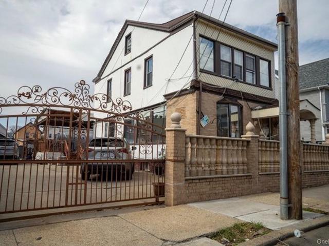 9728 th St, Richmond Hill, NY 11419