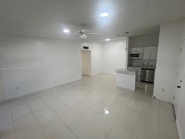 9743 W McNab Rd, Unit 209, Tamarac, FL 33321 | MLS #A12001 | Compass