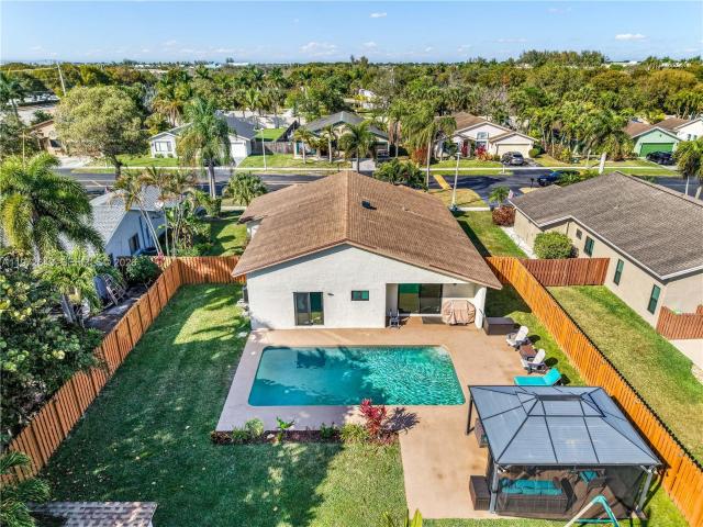 9986 NW 52nd St, Sunrise, FL 33351 | MLS #A11972 | Compass