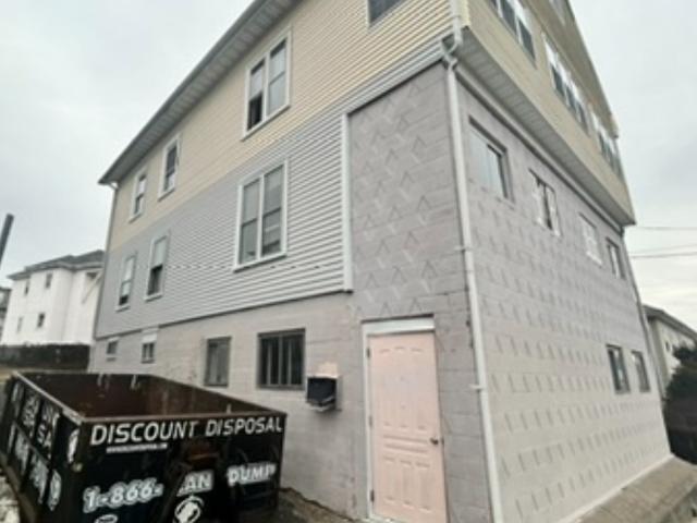 9 Parker St, Central Falls, RI 02863 | MLS #1410 | Compass