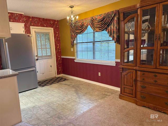 10046 WOODIE Lane