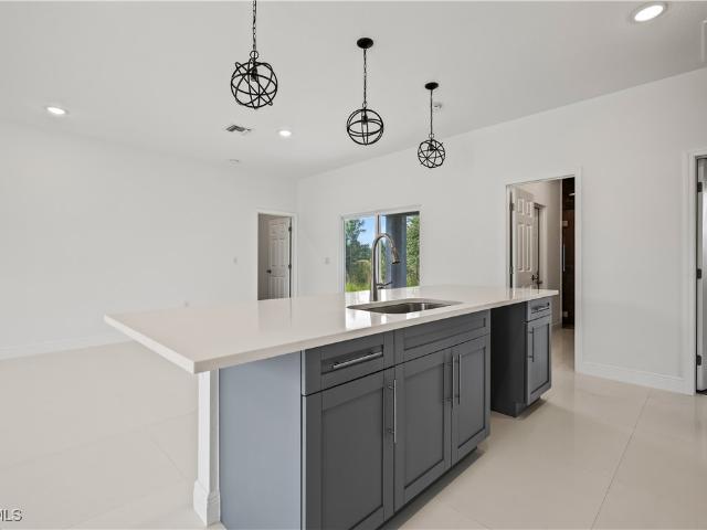 1004 E 10th St, Lehigh Acres, FL 33972 | MLS #2026018 | Compass