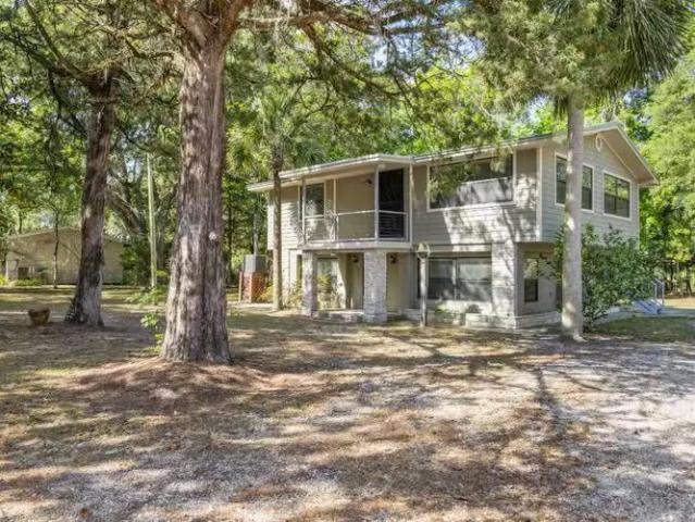 10069 NW 38TH TER, BRANFORD, FL 32008 Single Family Residence.