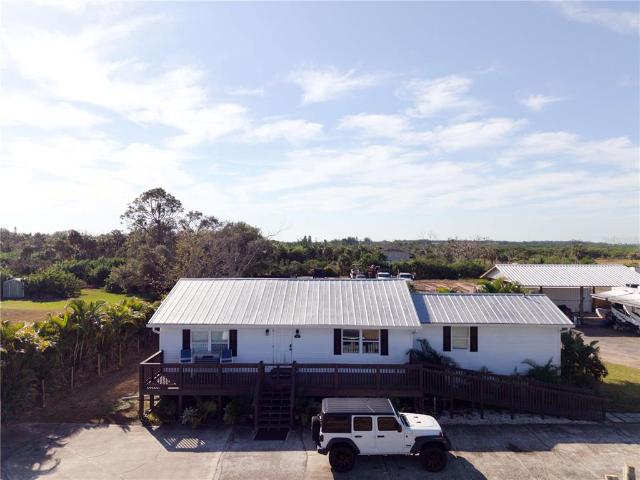1007 77th St E, Palmetto, FL 34221 | MLS #TB8472 | Compass
