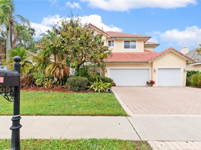 10091 NW 7th St, Plantation, FL 33324 | MLS #A11988 | Compass