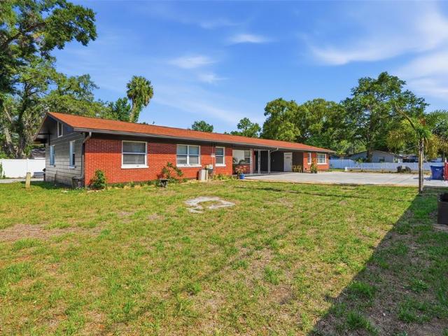10107 N Aster Ave, Tampa, FL 33612 | MLS #TB8503 | Compass