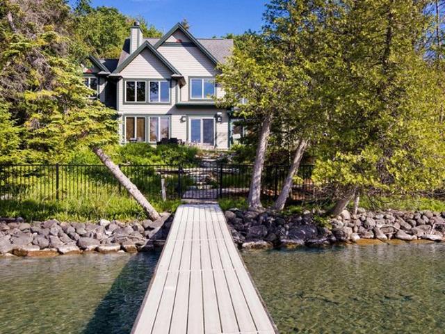 10242 E Elk Lake Dr, Rapid City, MI 49676
