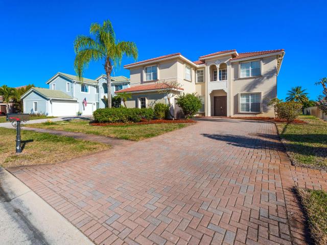 102 Ibisca Ter, Royal Palm Beach, FL 33411 | MLS #B26008 | Compass