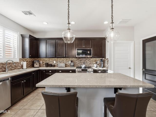 10347 w alyssa lane