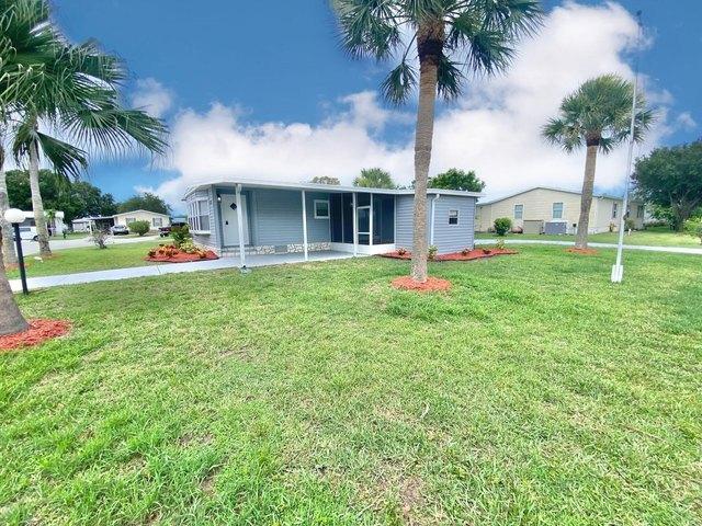 1038 Warbler Ct, Barefoot Bay, FL 32976