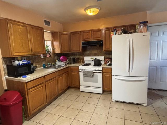 1032 Adams St, Uniondale, NY 11553 | MLS #963415 | Compass