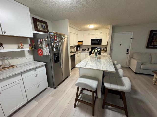 10425 E Clairmont Cir, Unit 107, Tamarac, FL 33321 | MLS #A11885 | Compass