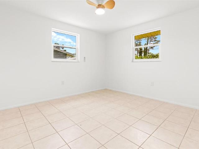 1057 Tropical Ave NW, Port Charlotte, FL 33948 | MLS #C7520