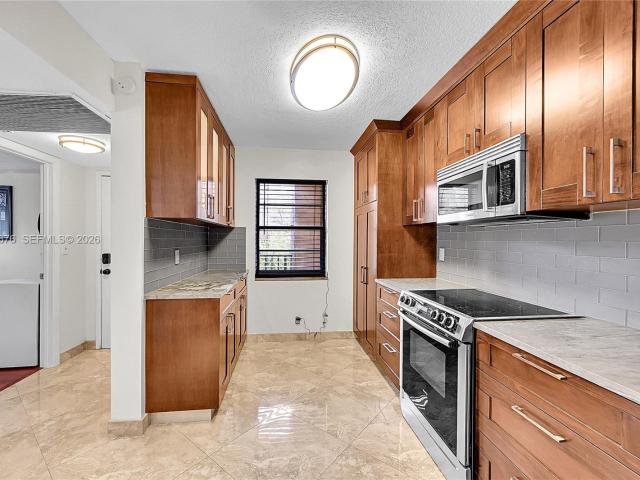 10501 W Broward Blvd, Unit 311, Plantation, FL 33324 | MLS #A11938