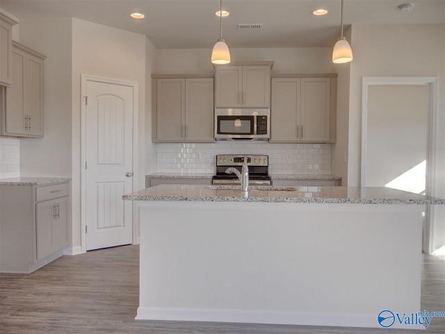 105 NW Fern Valley Court