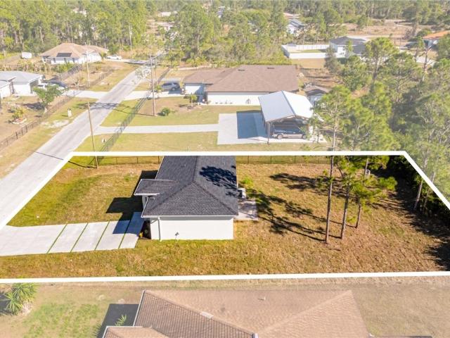 1064 Bells St E, Lehigh Acres, FL 33974 | MLS #2026003 | Compass