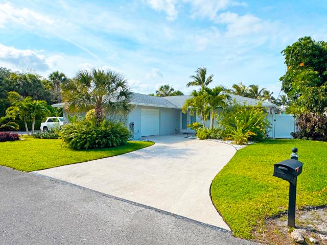 106 Periwinkle Dr, Hypoluxo, FL 33462 | MLS #B26026 | Compass