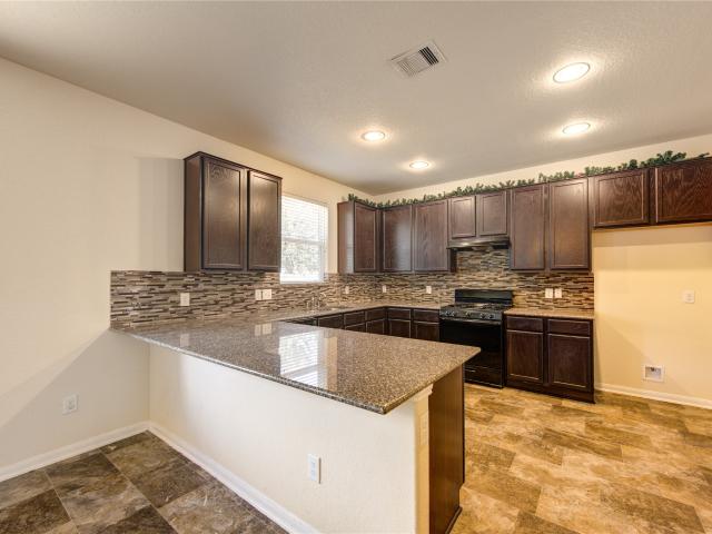 10907 Woodland Leaf Lane