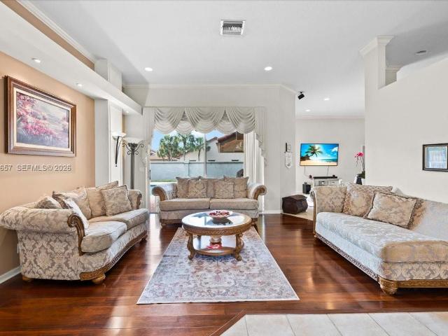10912 NW 2nd St, Plantation, FL 33324 | MLS #A12006 | Compass