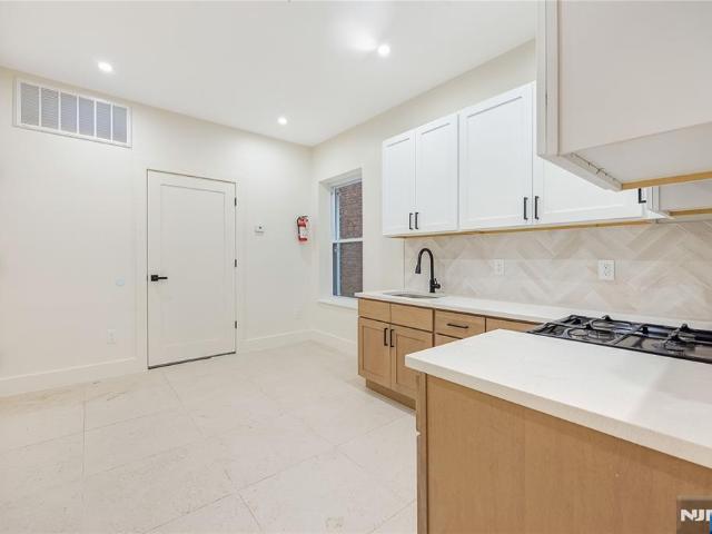 10 School St, Unit 2, Passaic, NJ 07055 | MLS #26012 | Compass
