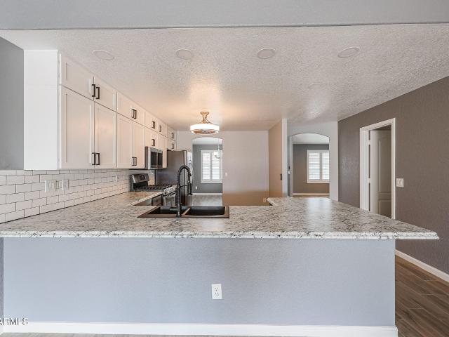 11059 W IRMA Lane