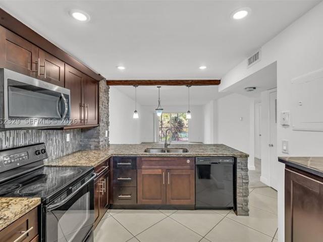 1100 NW 87th Ave Apt 307, Coral Springs, FL 33071