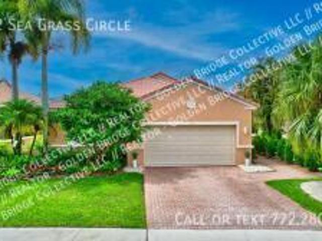 11182 Sea Grass Circle, 4 beds, 2 full and 1 half baths