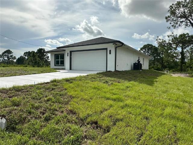 1125 Milwaukee Blvd, Lehigh Acres, FL 33974 | MLS #A12018