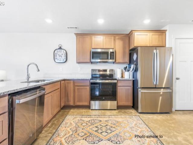 1129 NE 12TH ST