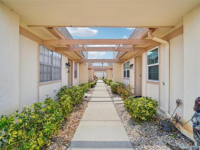 11210 Carriage Hill Dr, Unit 2, Port Richey, FL 34668 | MLS #TB8477 | Compass