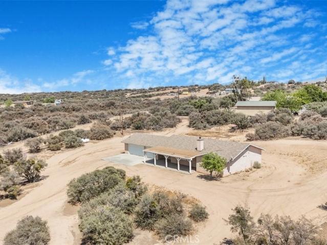 11221 Omelveny Rd, Oak Hills, CA 92344 | Compass