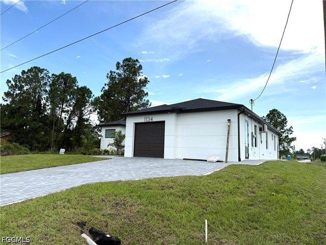 1134 Holmes Ave S, Lehigh Acres, FL 33974