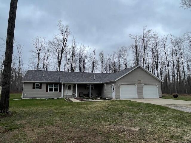 11311 Woodside Dr, Elmira, MI 49730