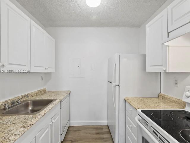 1133 Benoist Farms Rd, Unit 101, West Palm Beach, FL 33411 | MLS #A11957 | Compass