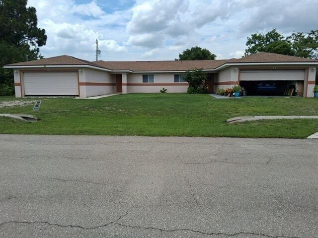 113 John Ave S, Lehigh Acres, FL 33973