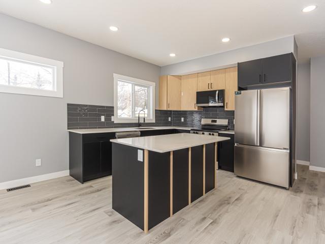 11547 Saint Albert Trl NW, 3 beds, 2 full and 1 half baths