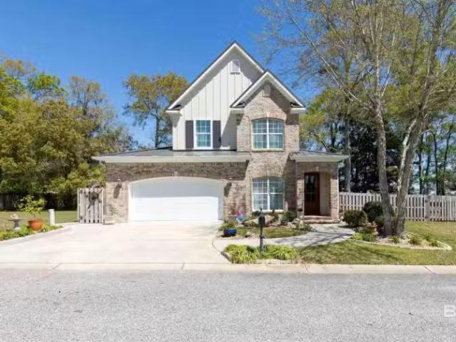 11747 GATES CIR E, THEODORE, AL 36582 Single Family Residence.