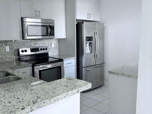 1175 NW 124 Pl, Unit 101, Miami, FL 33182 | MLS #A11917 | Compass