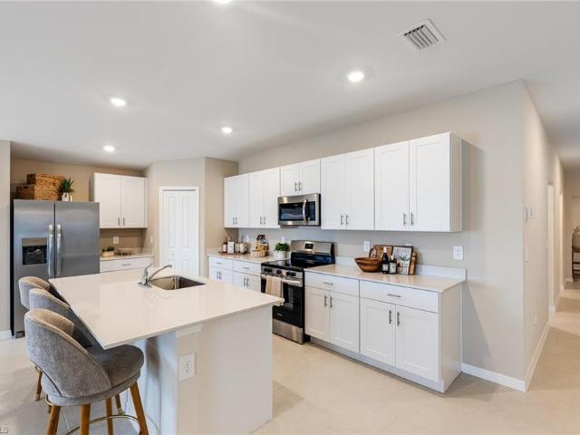 11909 Savanna Lks Blvd, Lehigh Acres, FL 33974 | Compass