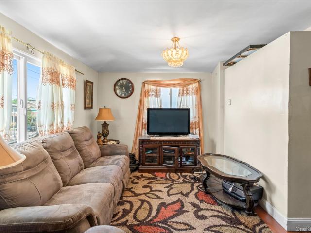 11917 Guy R Brewer Boulevard