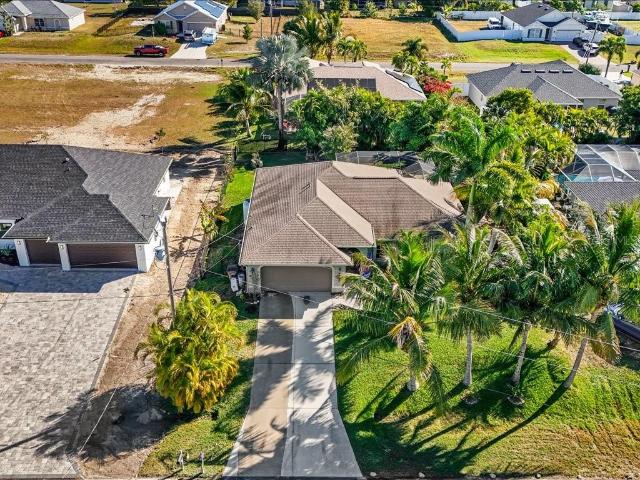 1209 NW 25th Pl, Cape Coral, FL 33993 | MLS #C7527