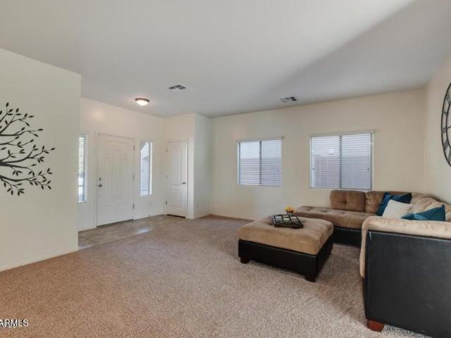 12039 W Leather Lane