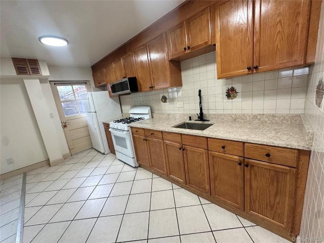 1214 East 224th Street | Compass
