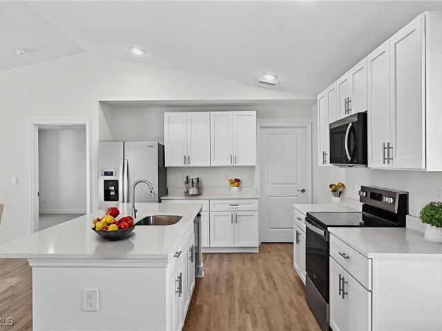 1219 NW 8th Pl, Cape Coral, FL 33993 | MLS #2026004 | Compass