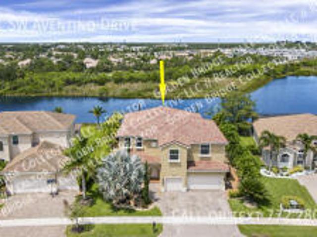 12101 SW Aventino Drive, 5 beds, 4 full and 1 half baths